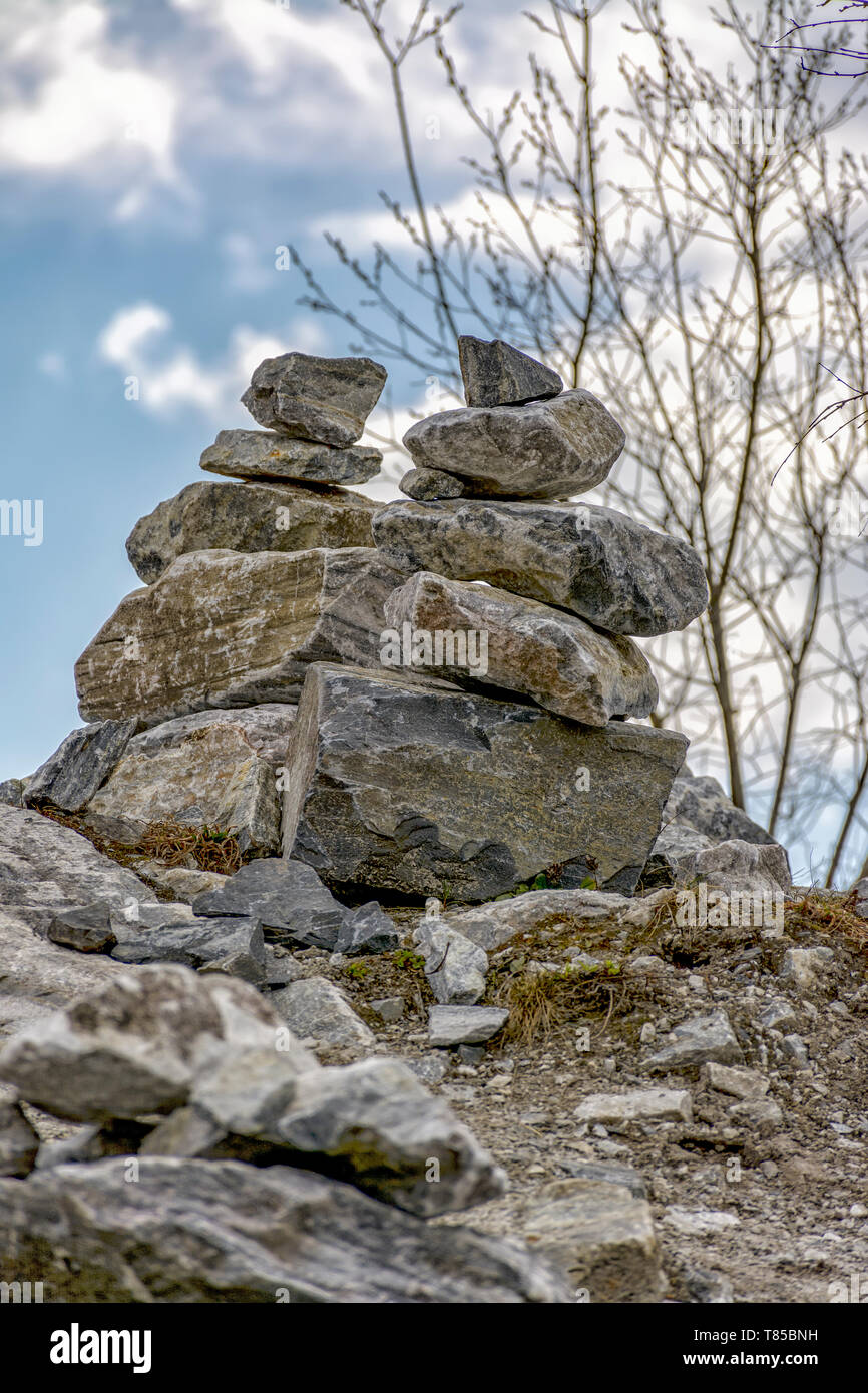 Stone pyramids built by tourists from pieces of marble in the mountain ...