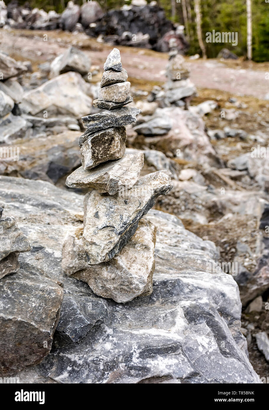 Stone pyramids built by tourists from pieces of marble in the mountain ...