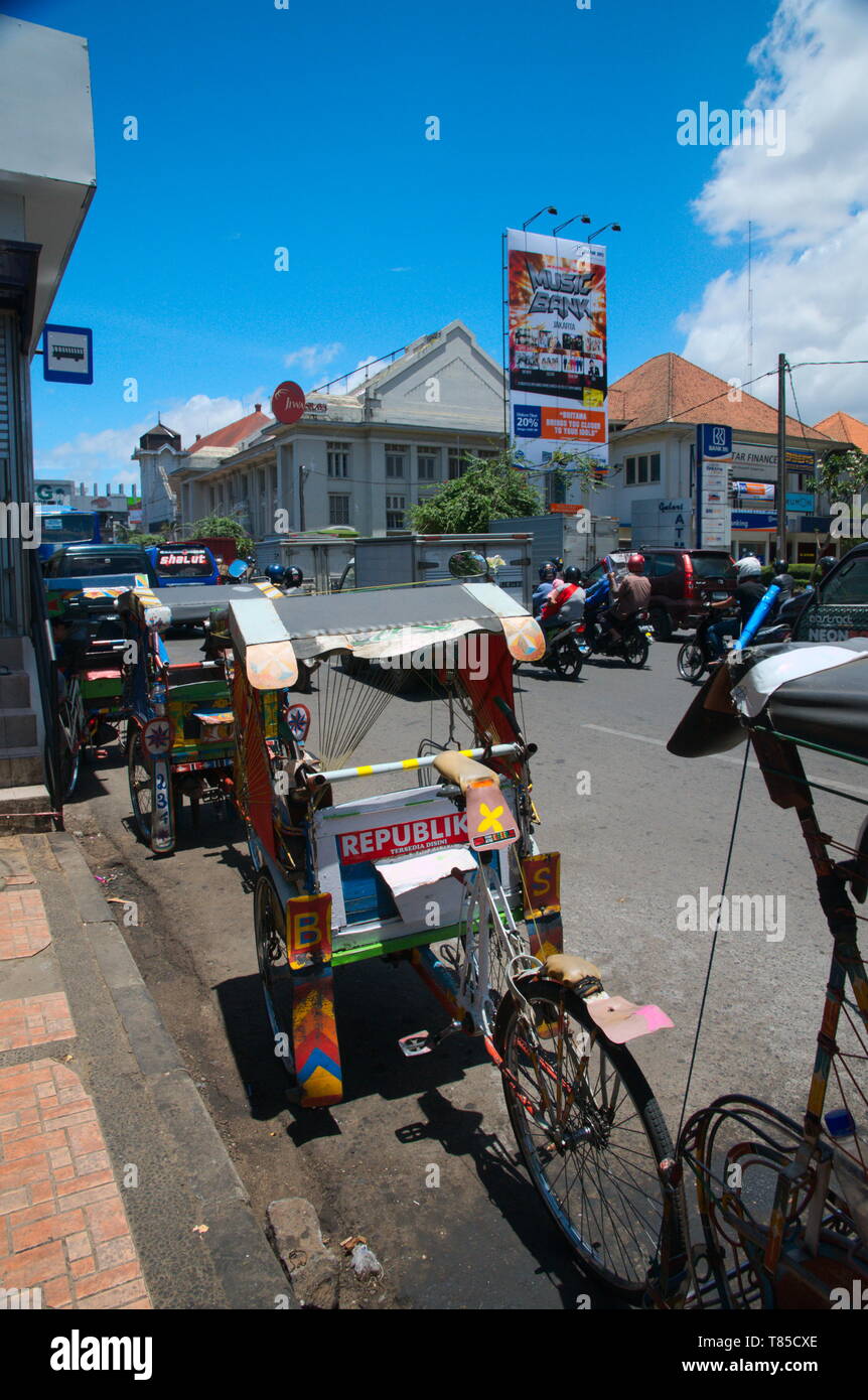 Bandung, Indonesia - February 28, 2013: Becak or Indonesian cycle ...