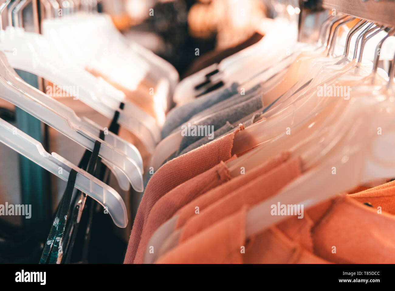 Casual Clothes And Shirts Hanged On Fashion Store Hanger Stock Photo ...