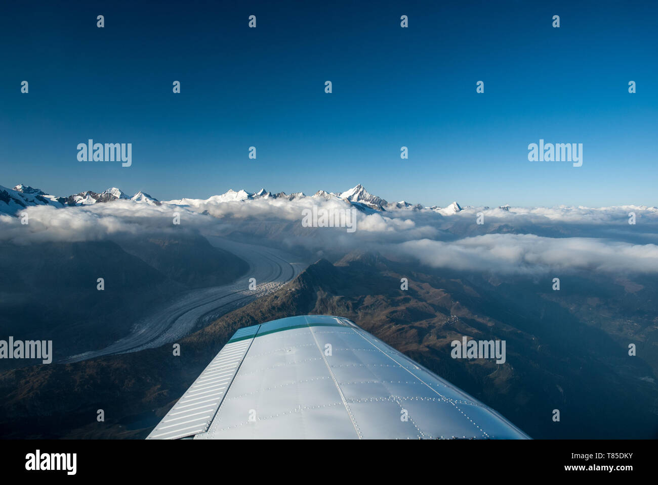 Sightseeing flight around the Swiss Alps Stock Photo - Alamy