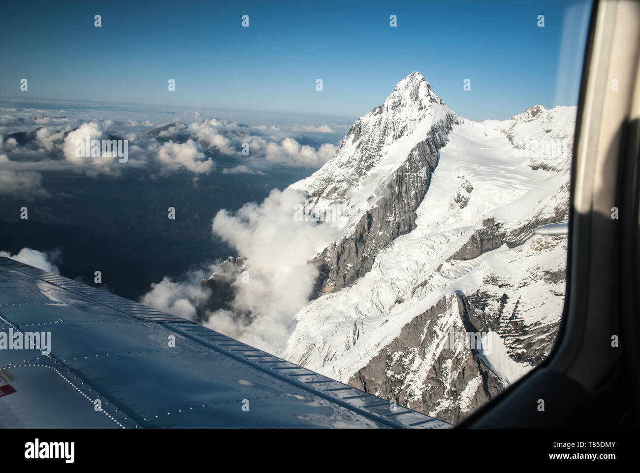 Sightseeing flight around the Swiss Alps Stock Photo - Alamy