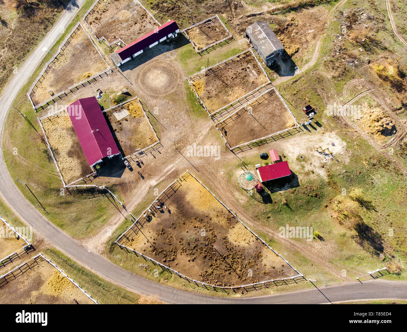 Aerial drone view of rural horse farm or ranch. Village or countryside ...