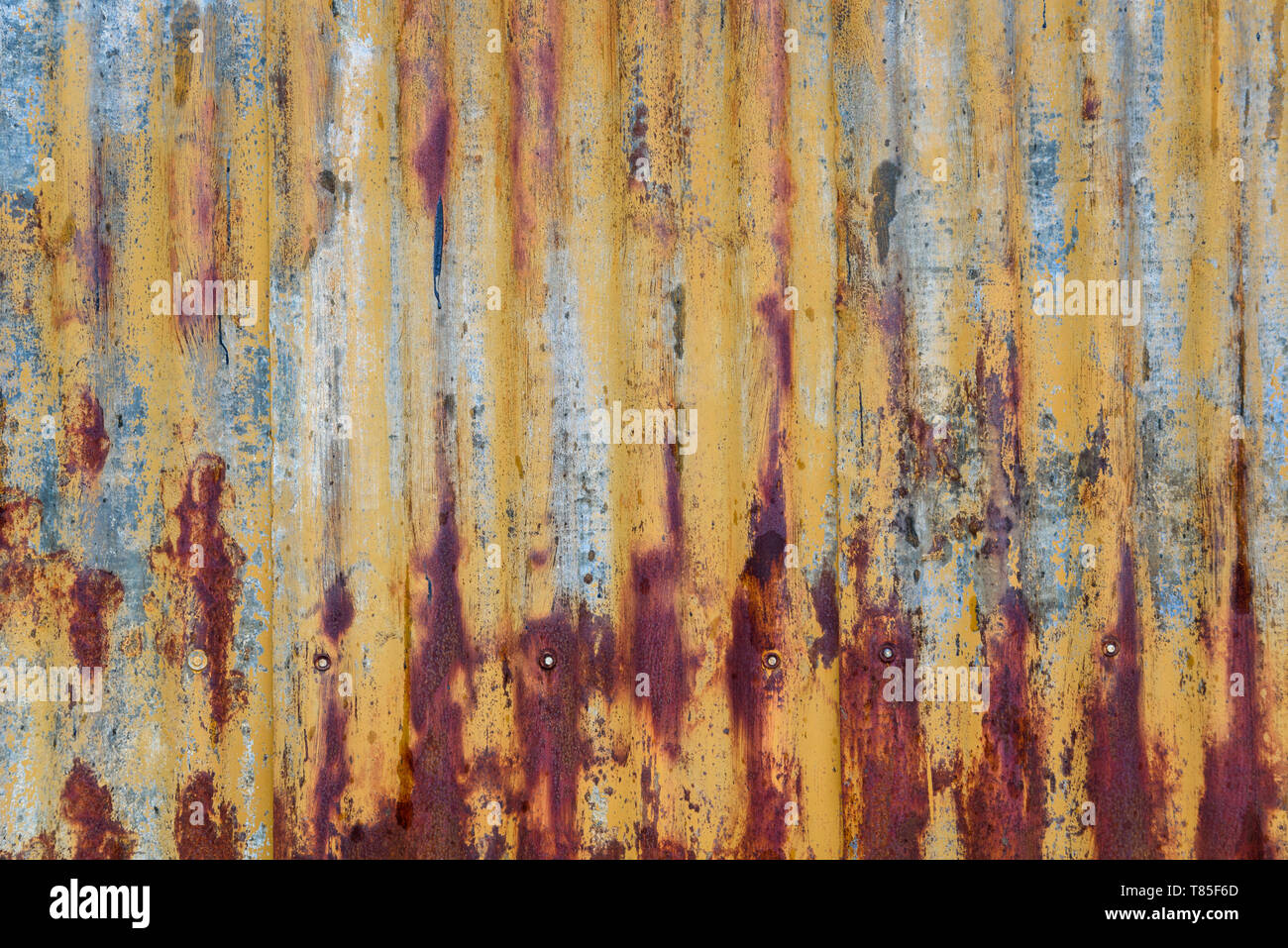 Rusty sheet of corrugated metal wall, as a textured background Stock ...