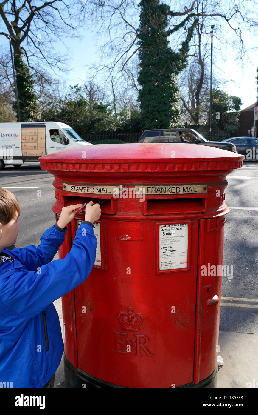Boy posting letter hi-res stock photography and images - Alamy