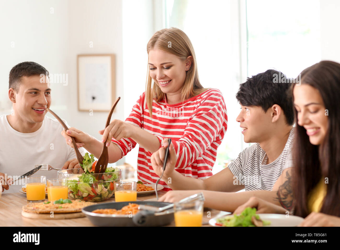 Male friends kitchen vegetables hi-res stock photography and images - Alamy