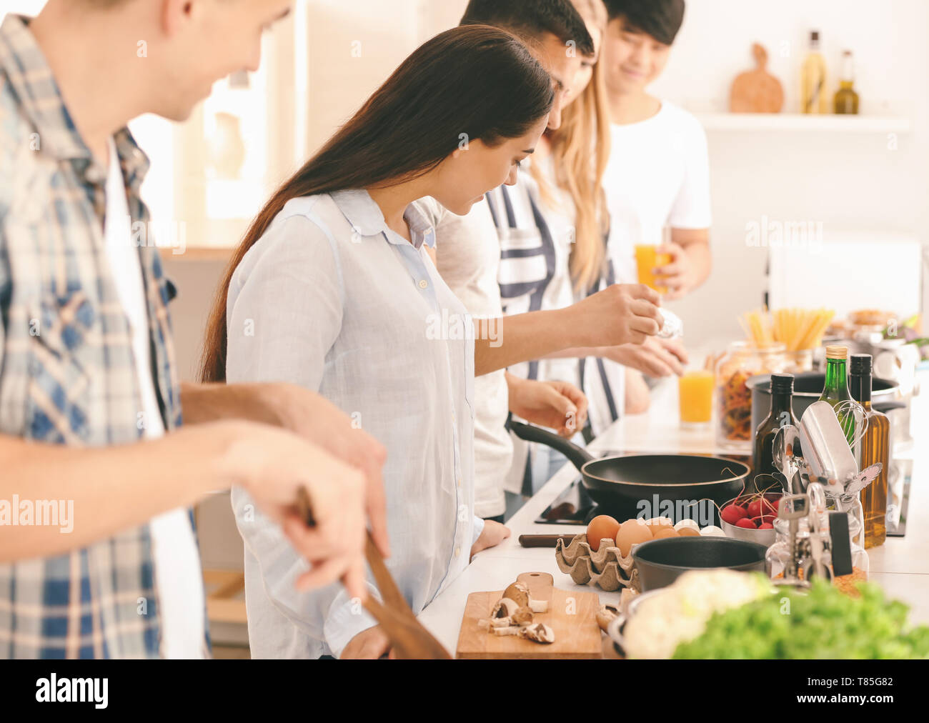Young friends fun frying hi-res stock photography and images - Alamy