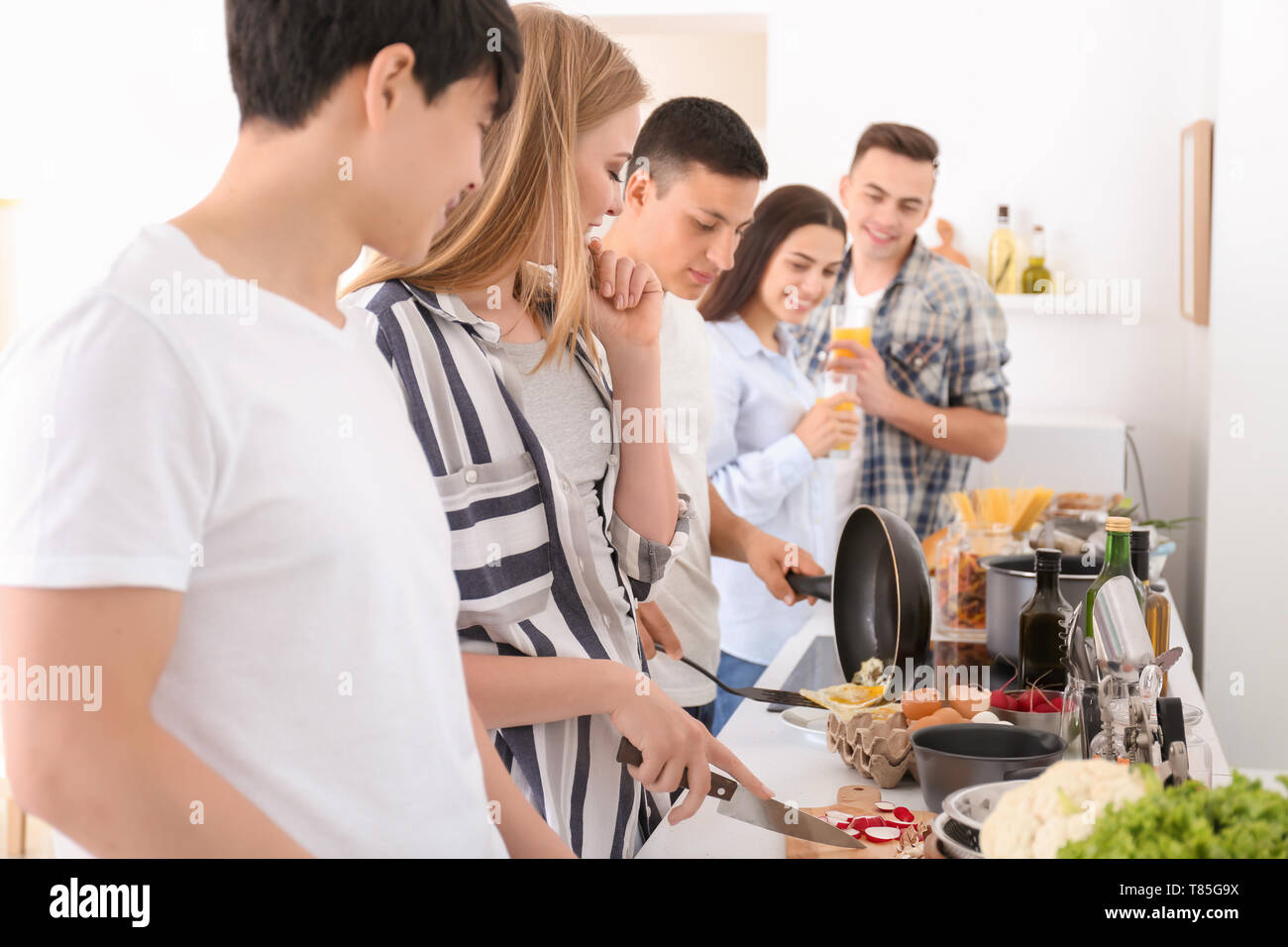 Young friends fun frying hi-res stock photography and images - Alamy