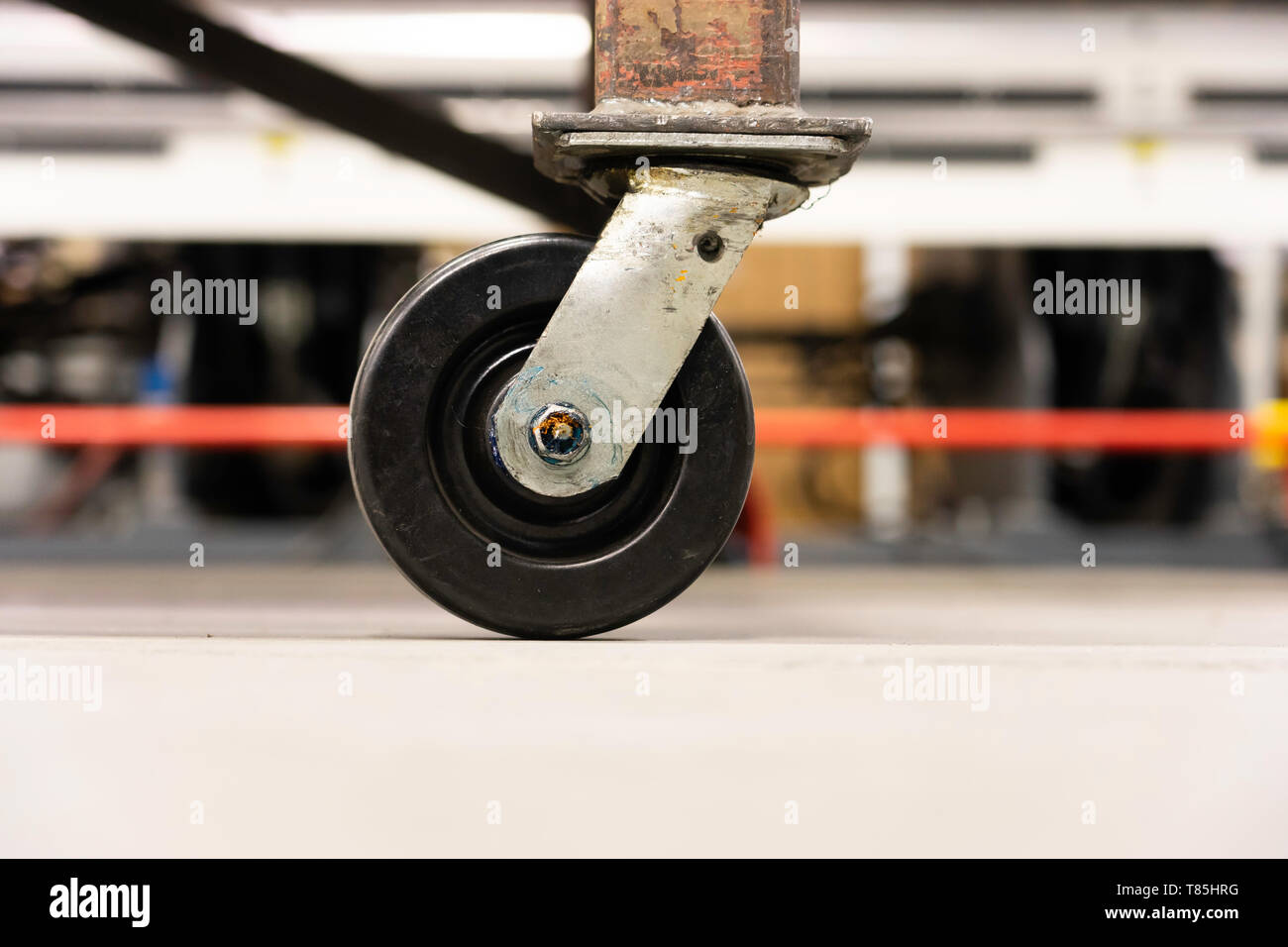 Castor - Caster wheels on factory workshop floor on a trolley Stock ...