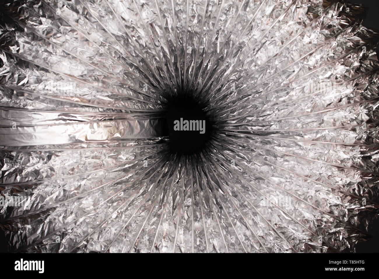 Silver tinfoil tube for ventilator Stock Photo - Alamy