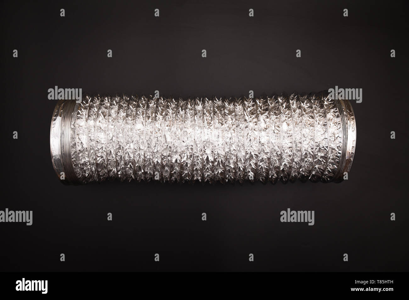 Silver tinfoil tube for ventilator Stock Photo - Alamy