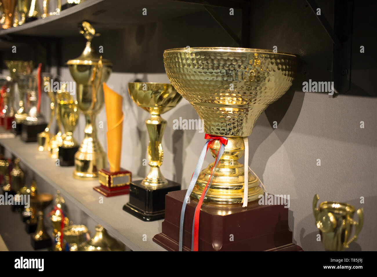 Golden cups medal trophies hi-res stock photography and images - Alamy