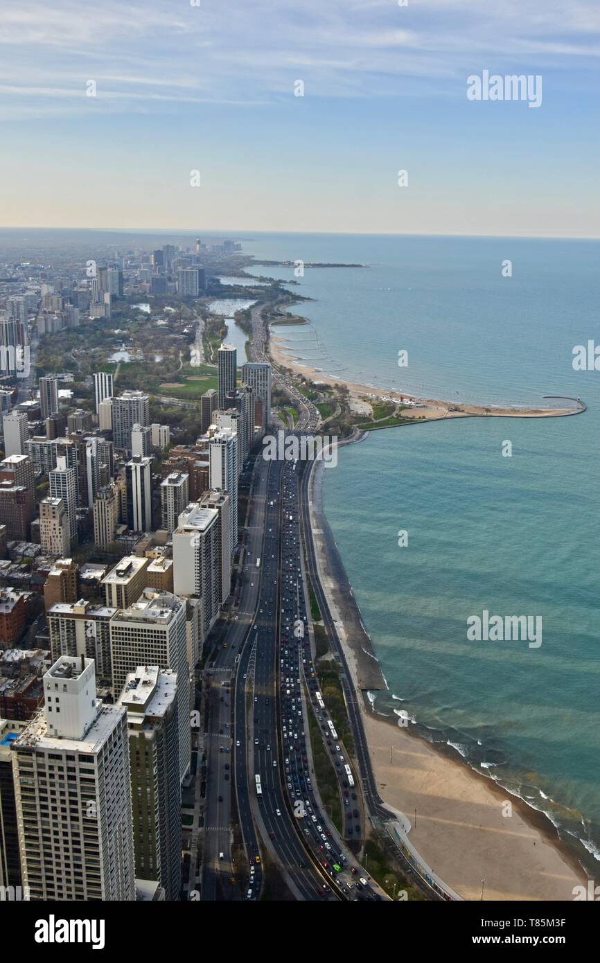 Chicago at sunset as seen from above at 360 Chicago atop the John ...