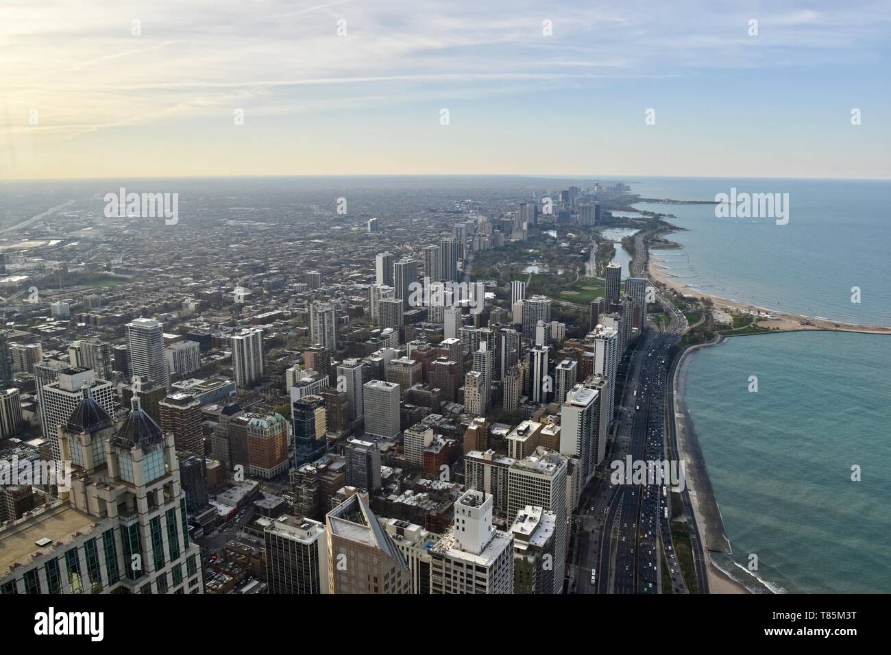 Chicago at sunset as seen from above at 360 Chicago atop the John ...