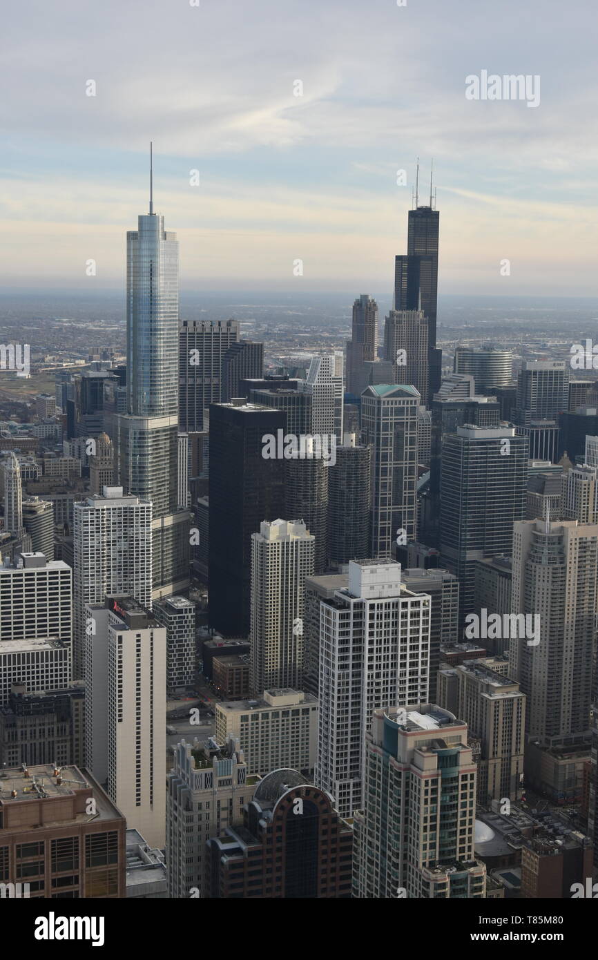 Chicago at sunset as seen from above at 360 Chicago atop the John ...