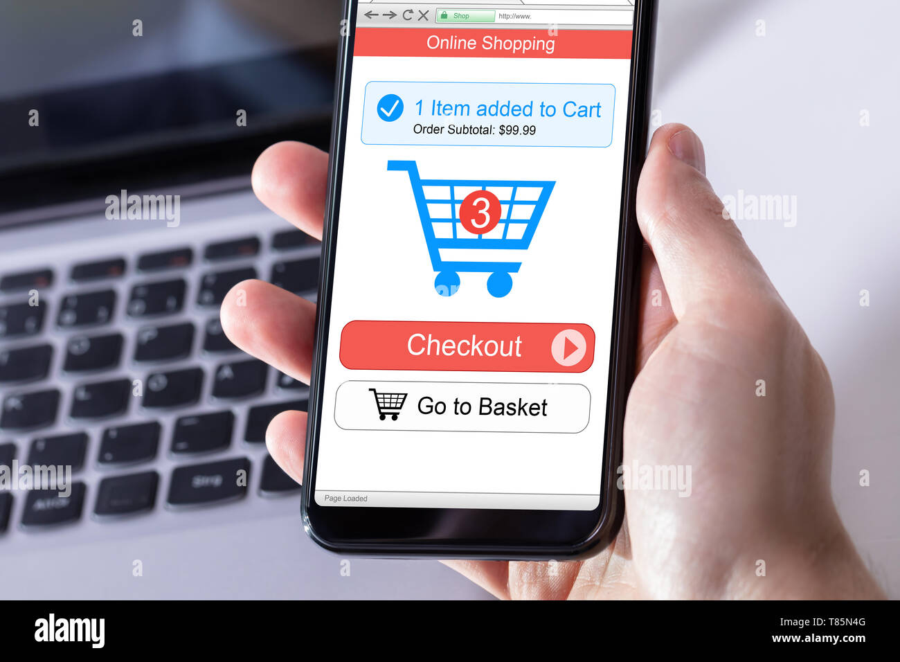 Human Hand Holding Mobile Phone With Online Shopping Application Stock ...