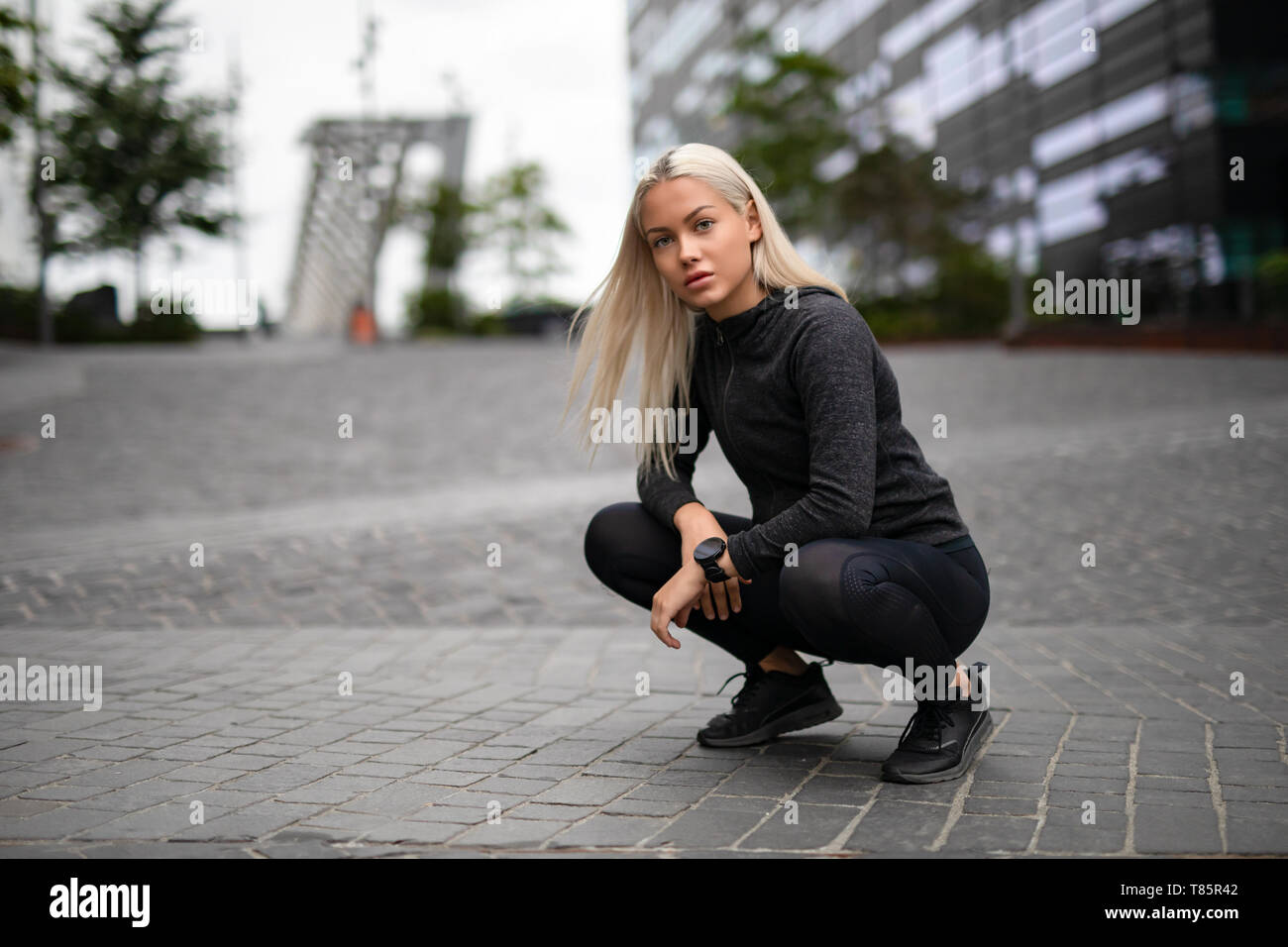 Good Looking Female Runner Using Smartwatch to Check Running ...