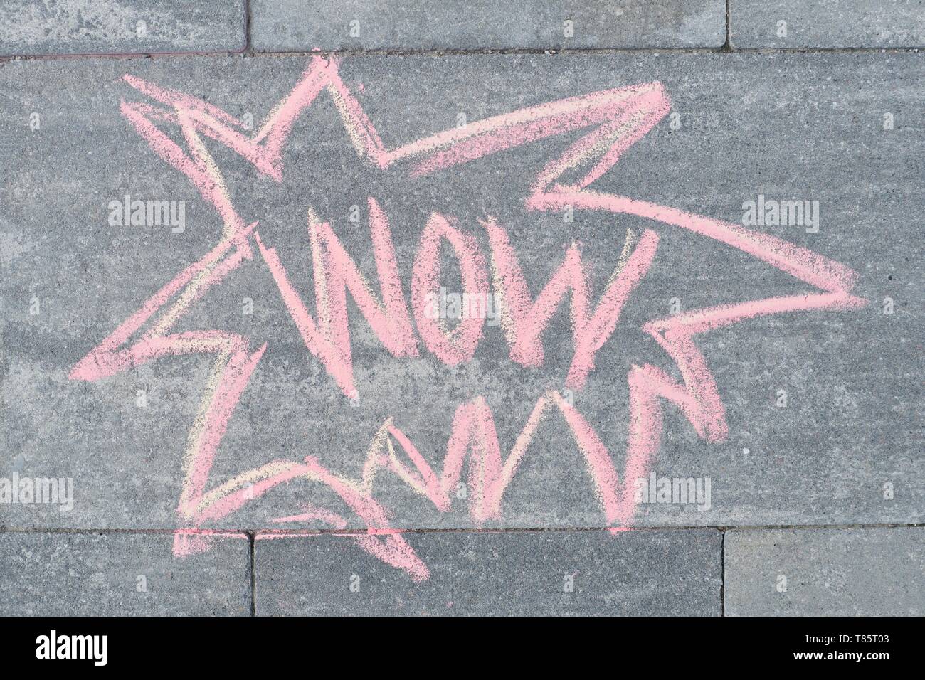 Wow written on gray sidewalk, top view Stock Photo - Alamy