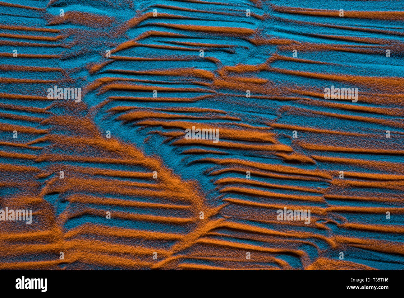 top view of textured sandy background with color filter and abstract ...