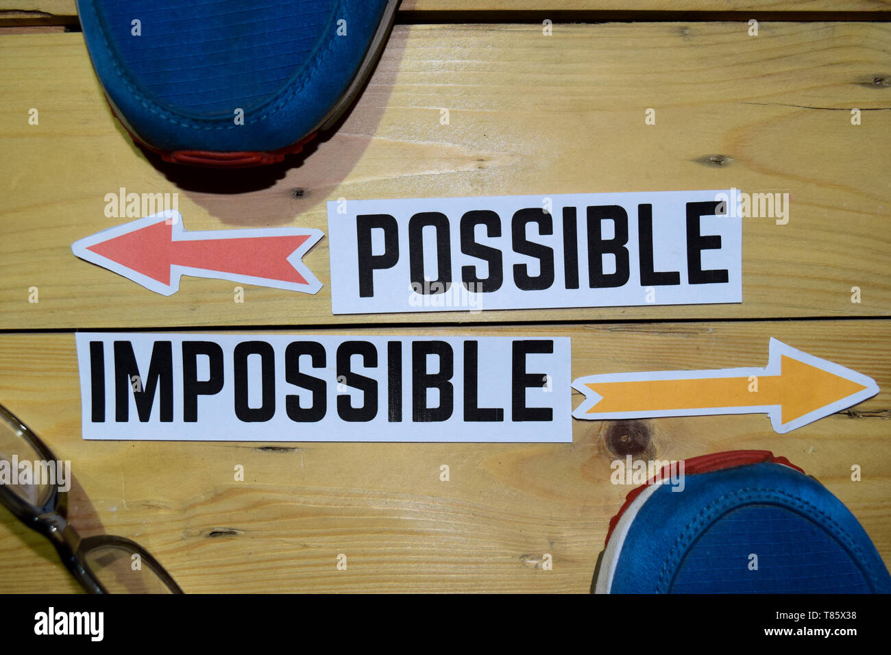 Possible or Impossible opposite direction signs with sneakers and ...