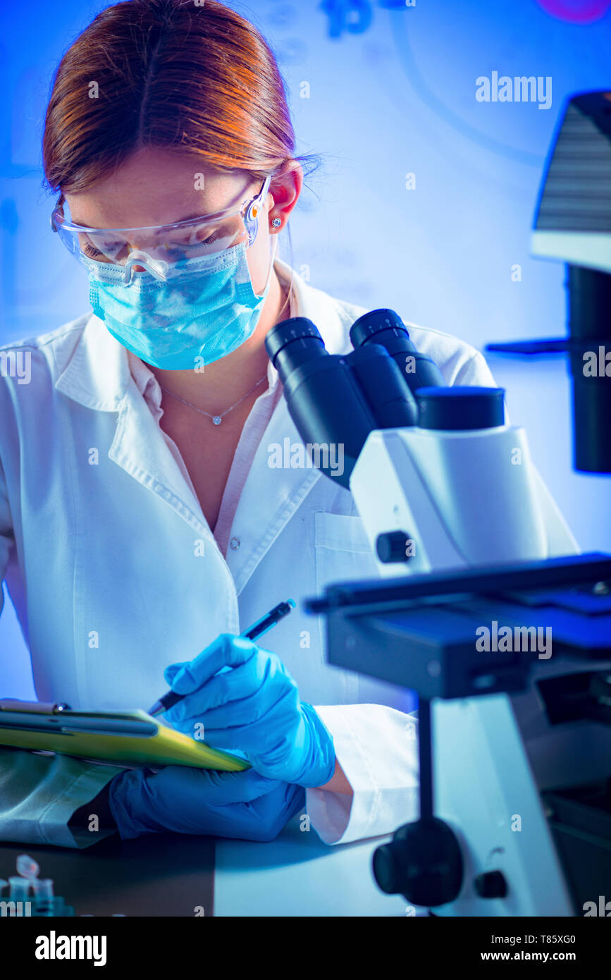 Scientist people writing notes hi-res stock photography and images - Alamy