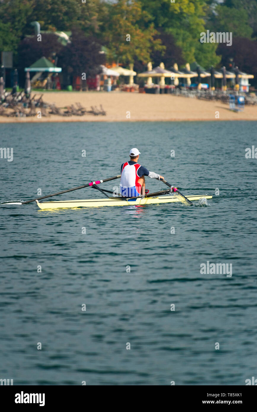 Man rowing scull Stock Photo - Alamy