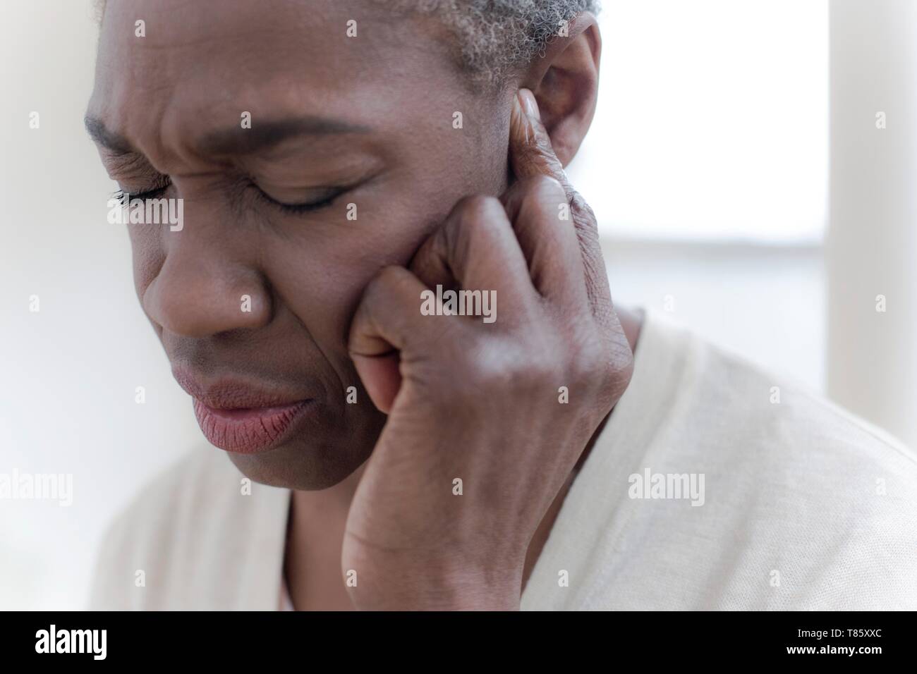Ear pain hi-res stock photography and images - Alamy