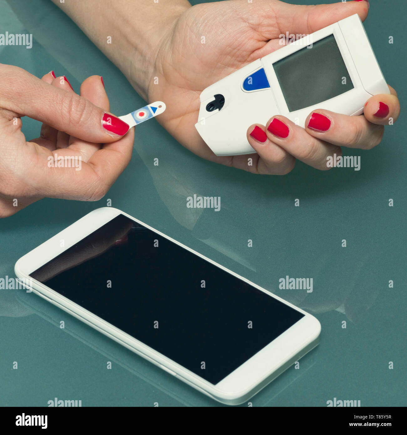 Diabetes finger glucose meter hi-res stock photography and images - Alamy
