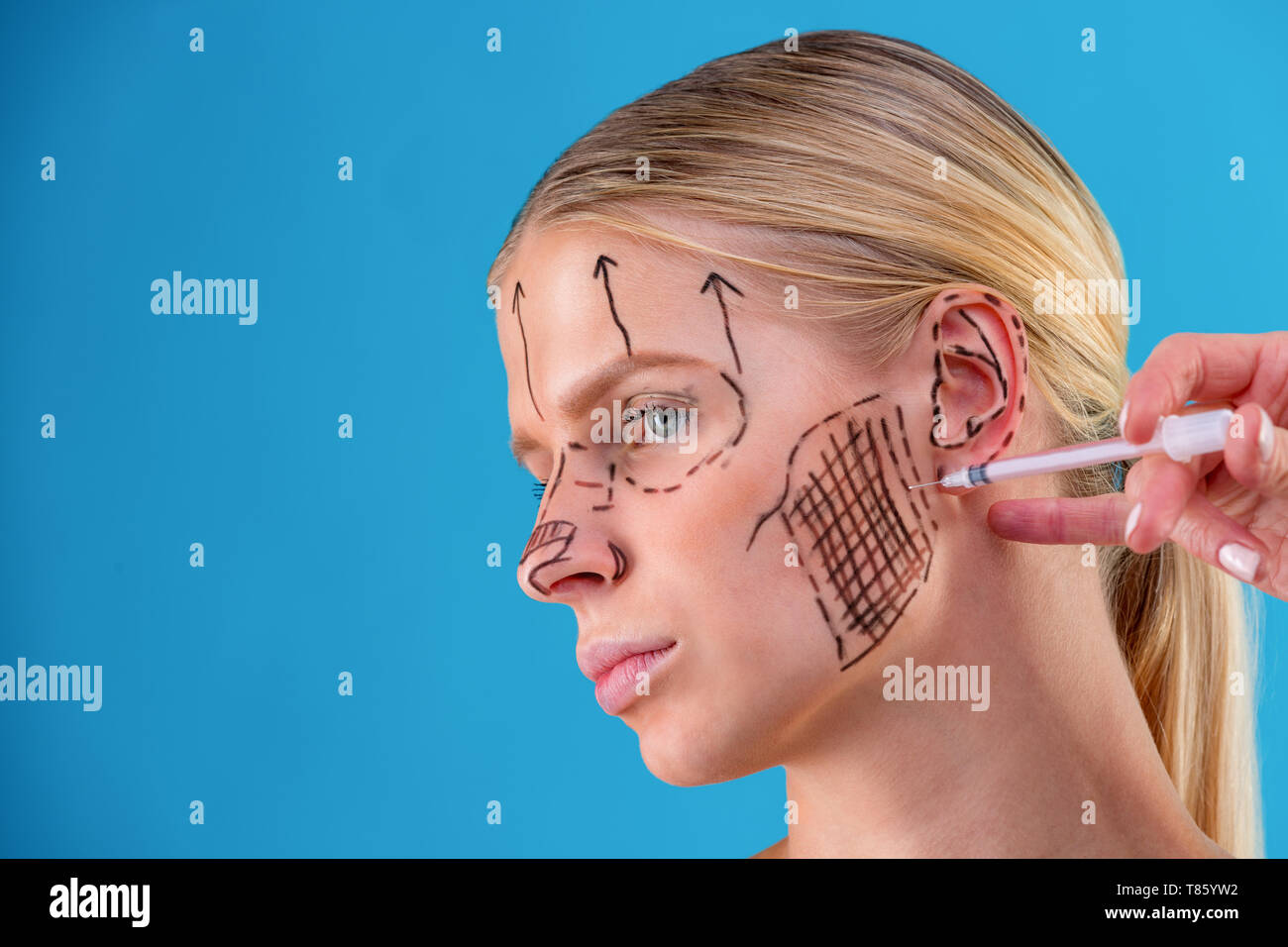 face of a girl with smooth skin without wrinkles makes beauty shots ...