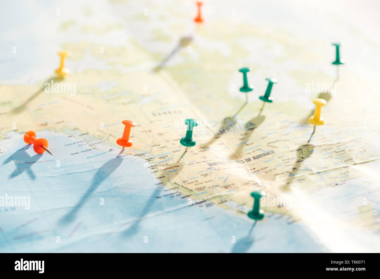 selective focus of world map with colorful push pins Stock Photo - Alamy