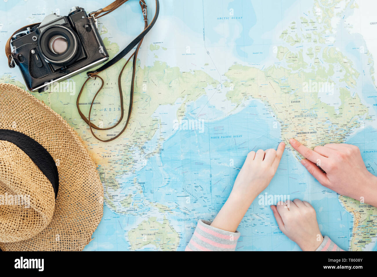 Child pointing world map hi-res stock photography and images - Alamy