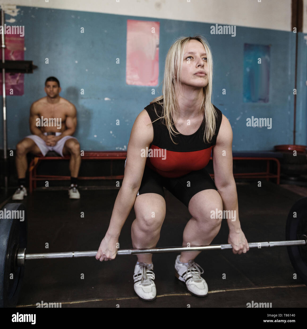 Two men lifting weights in gym hi-res stock photography and images - Alamy
