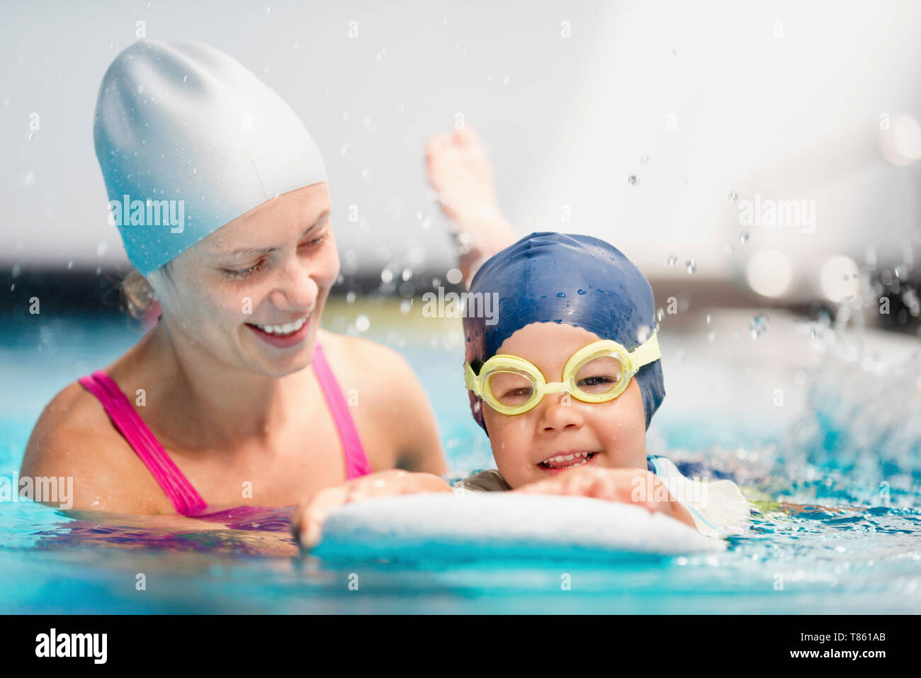 Kid swimming kicking hi-res stock photography and images - Alamy