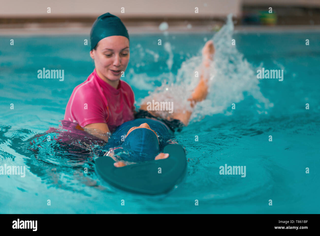 Cute Swimming Class In Pool High Resolution Stock Photography and ...