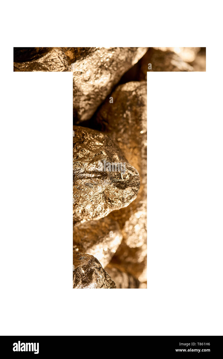 letter T made of shiny golden stones isolated on white Stock Photo - Alamy
