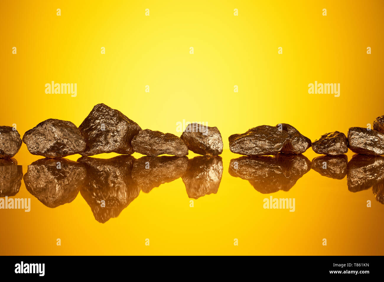 gold shiny textured stones with reflection and yellow back light Stock ...
