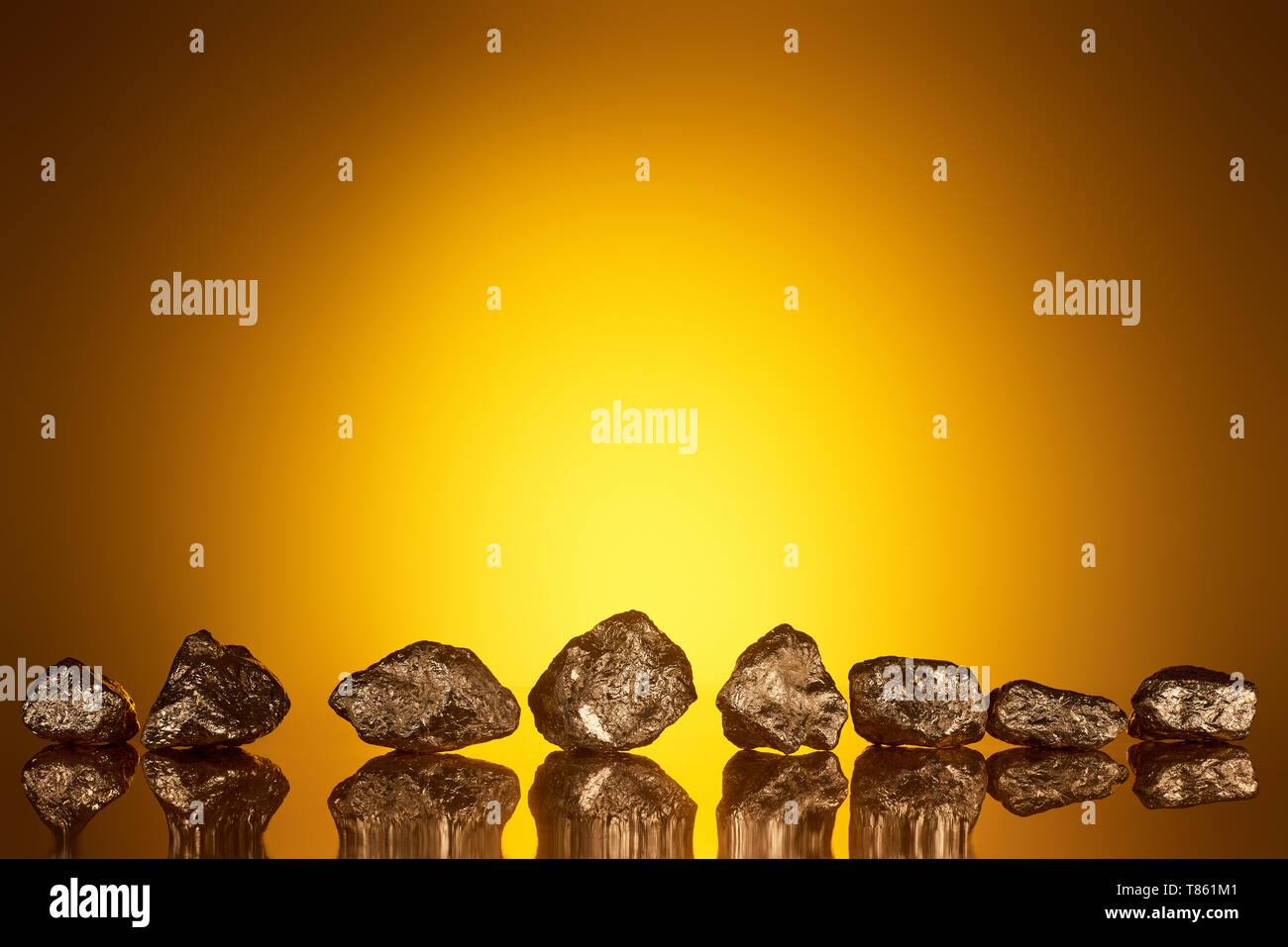 gold shiny stones with reflection and yellow back light Stock Photo - Alamy