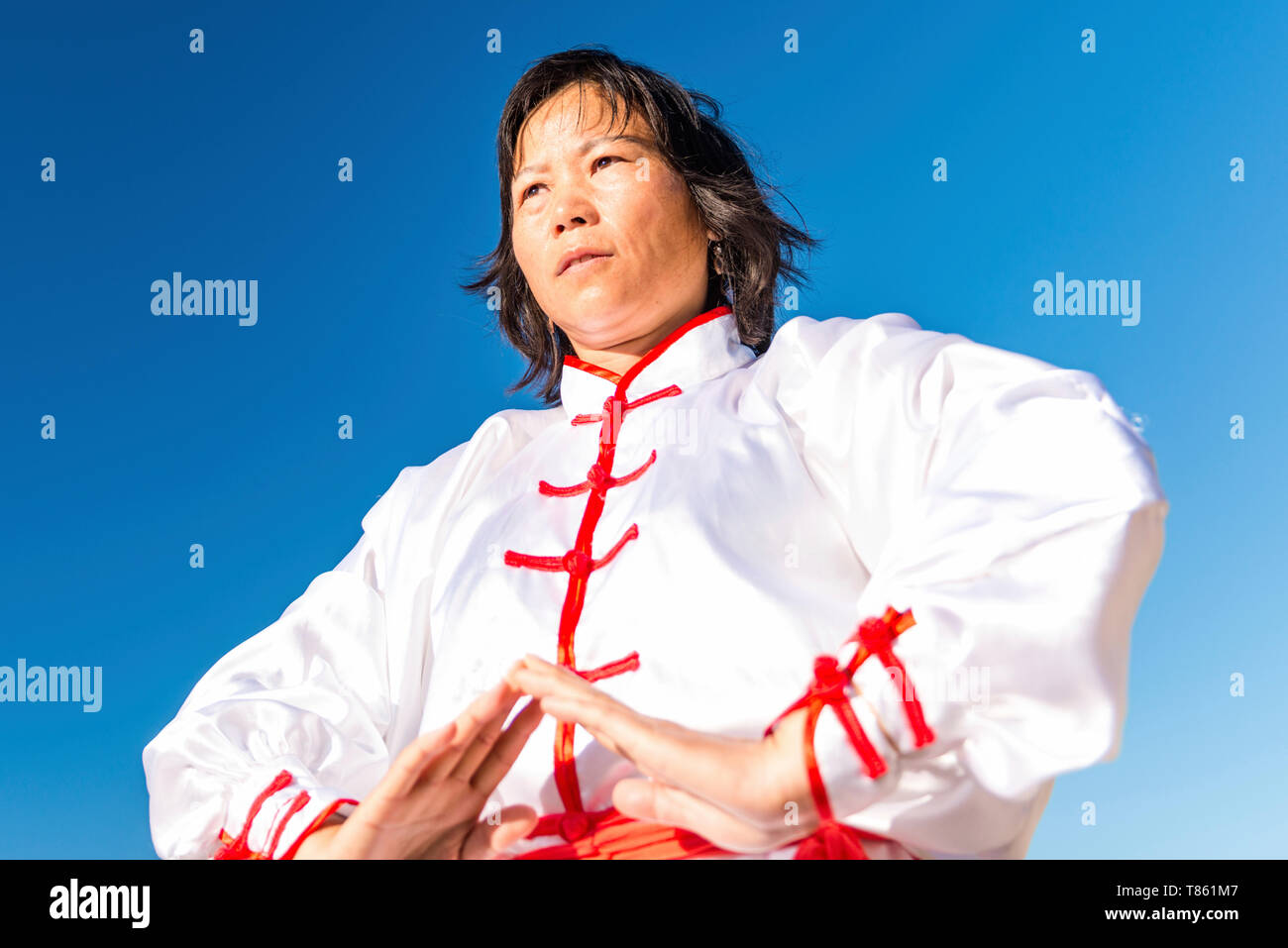 Woman practicing tai chi water hi-res stock photography and images - Alamy