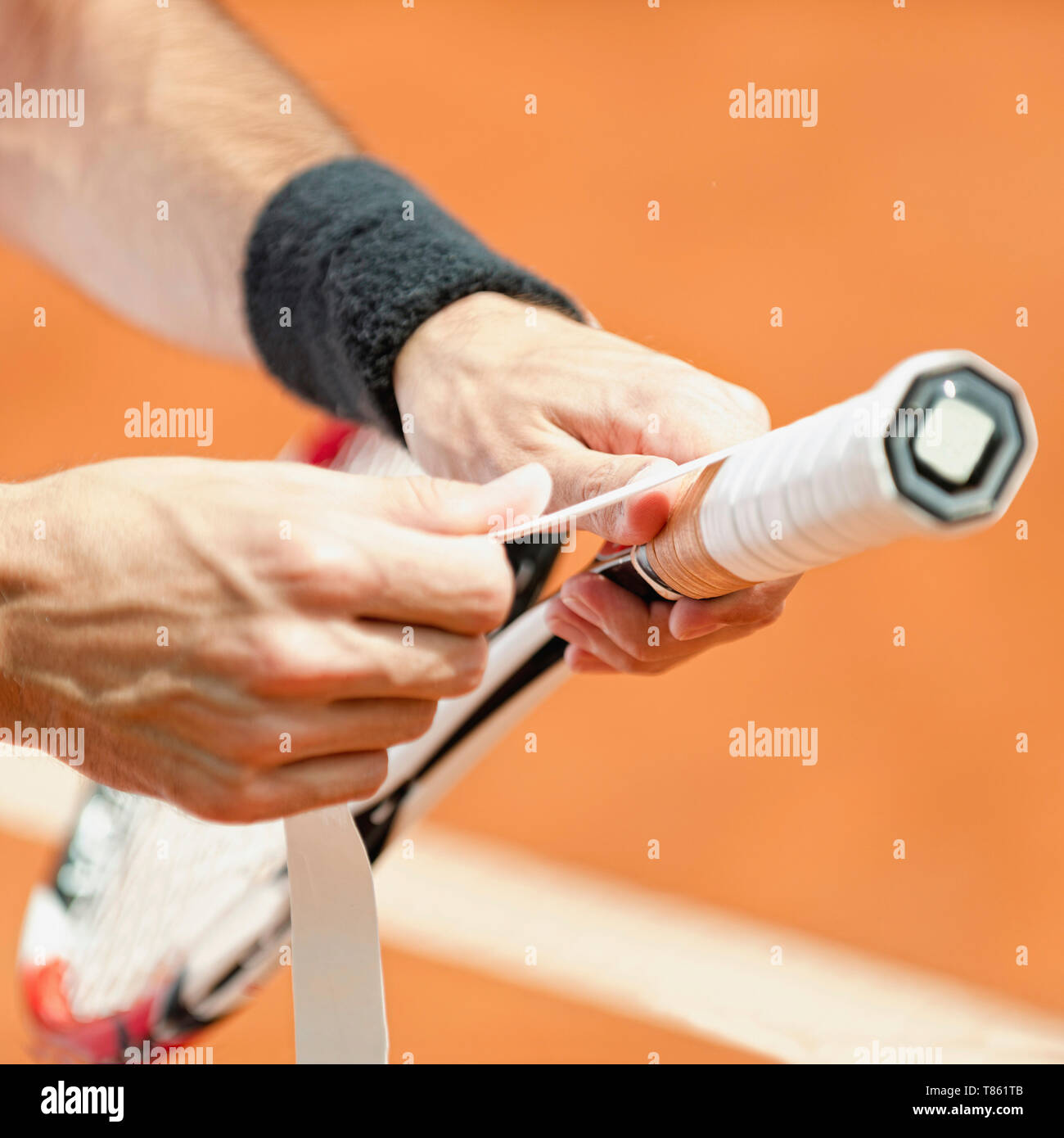 Tennis player gripping tennis racket hi-res stock photography and ...