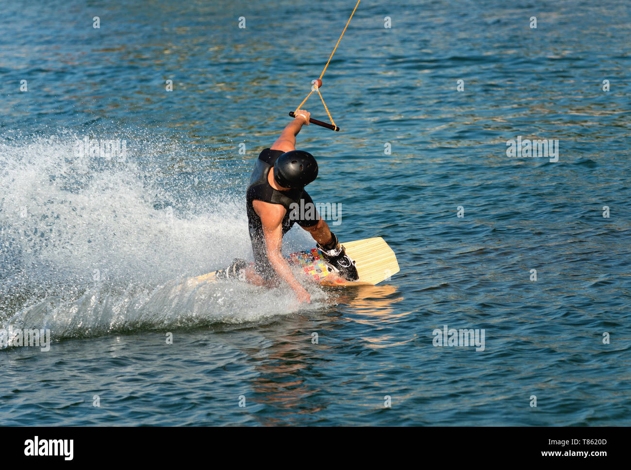 Young man wakeboarding Stock Photo - Alamy