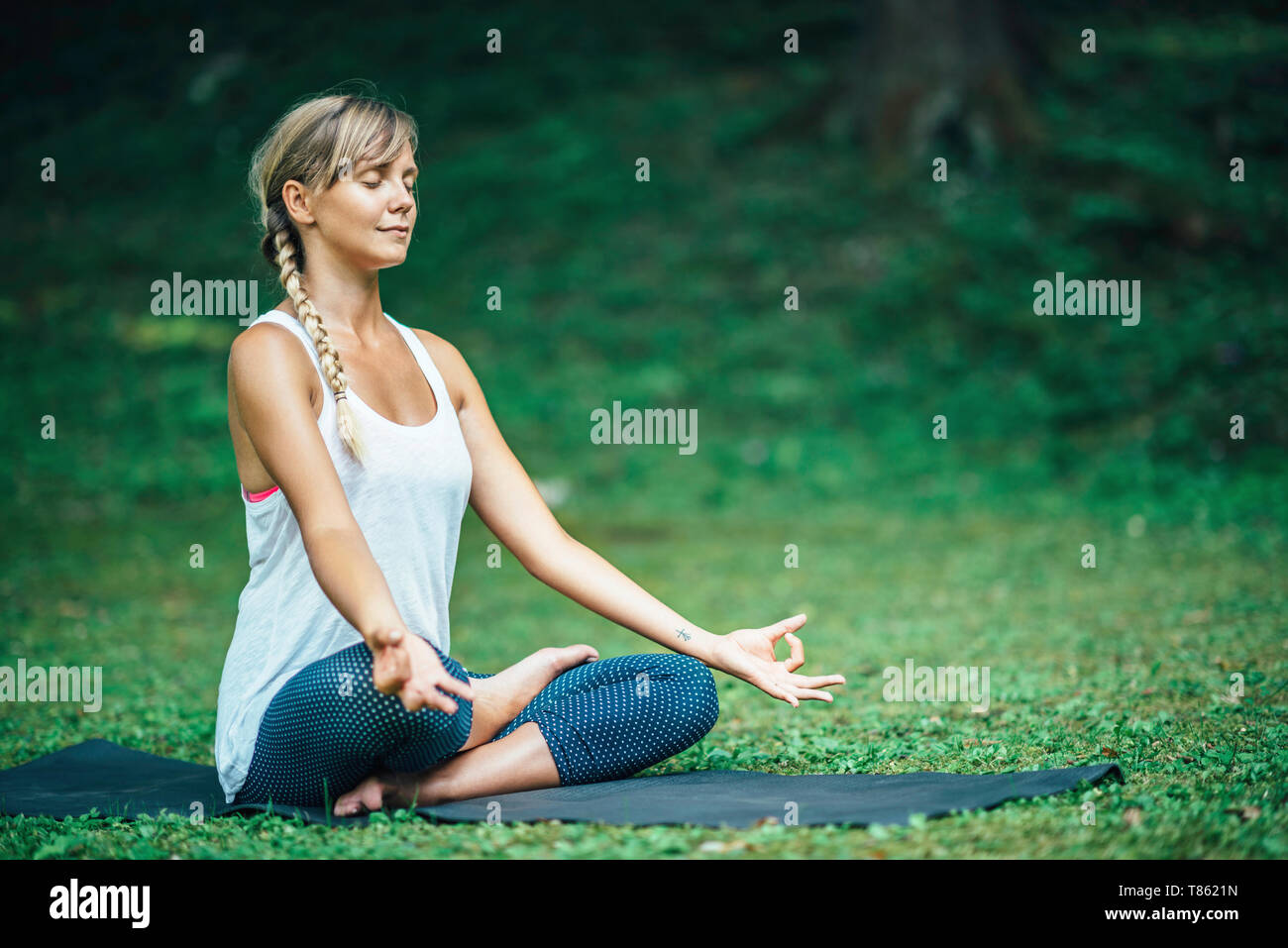 Yoga lotus position Stock Photo - Alamy