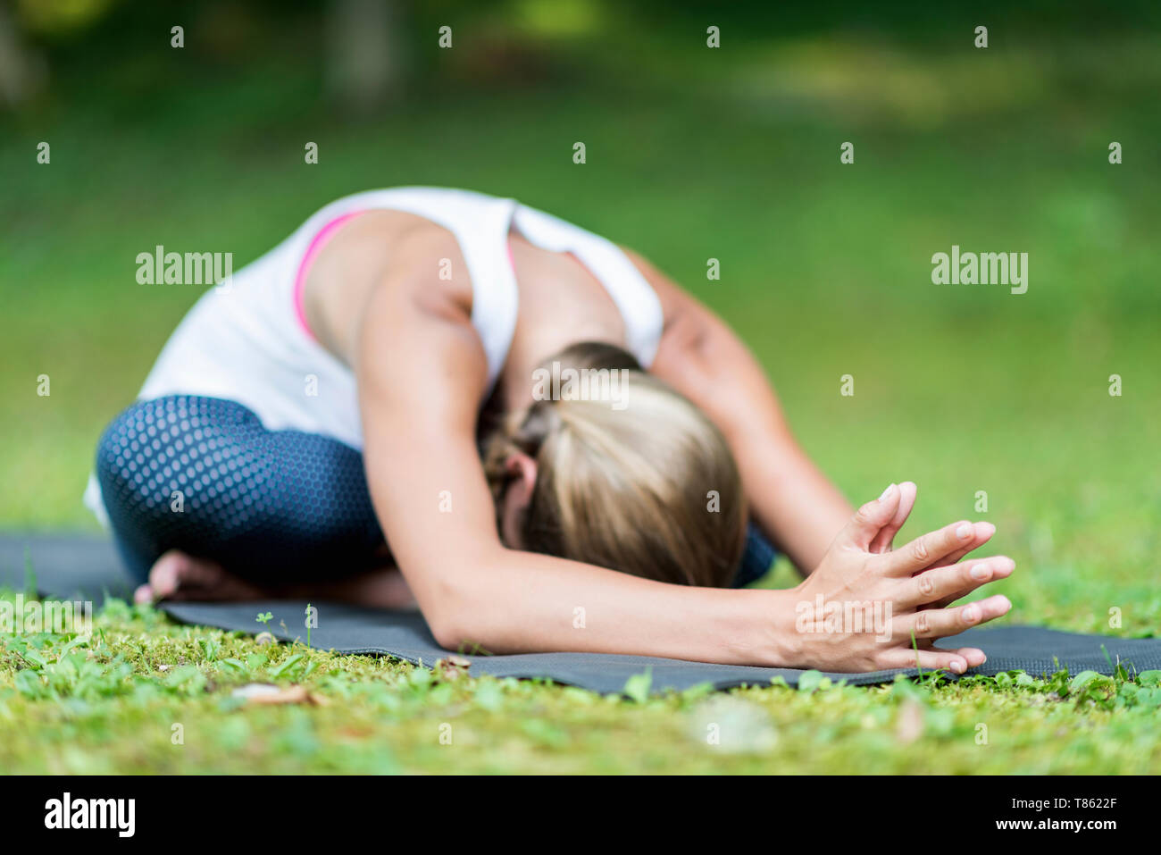 Yoga sitting bend hi-res stock photography and images - Alamy