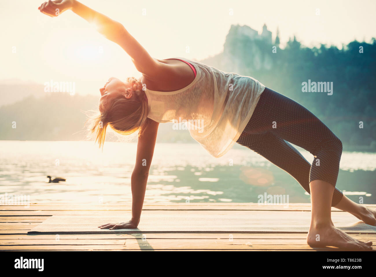 Yoga sun salutation hi-res stock photography and images - Alamy