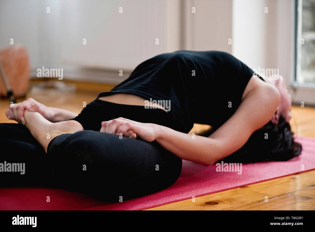 Yoga fish posture Stock Photo - Alamy