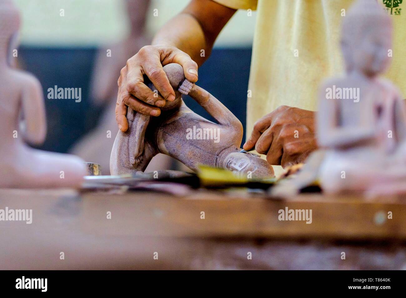 Cambodia, handicraft, stone sculpture of a Buddha head Stock Photo - Alamy