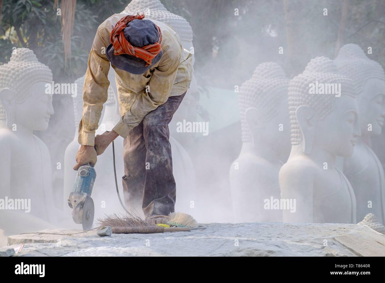 Cambodia, handicraft, stone sculpture of a Buddha head Stock Photo - Alamy