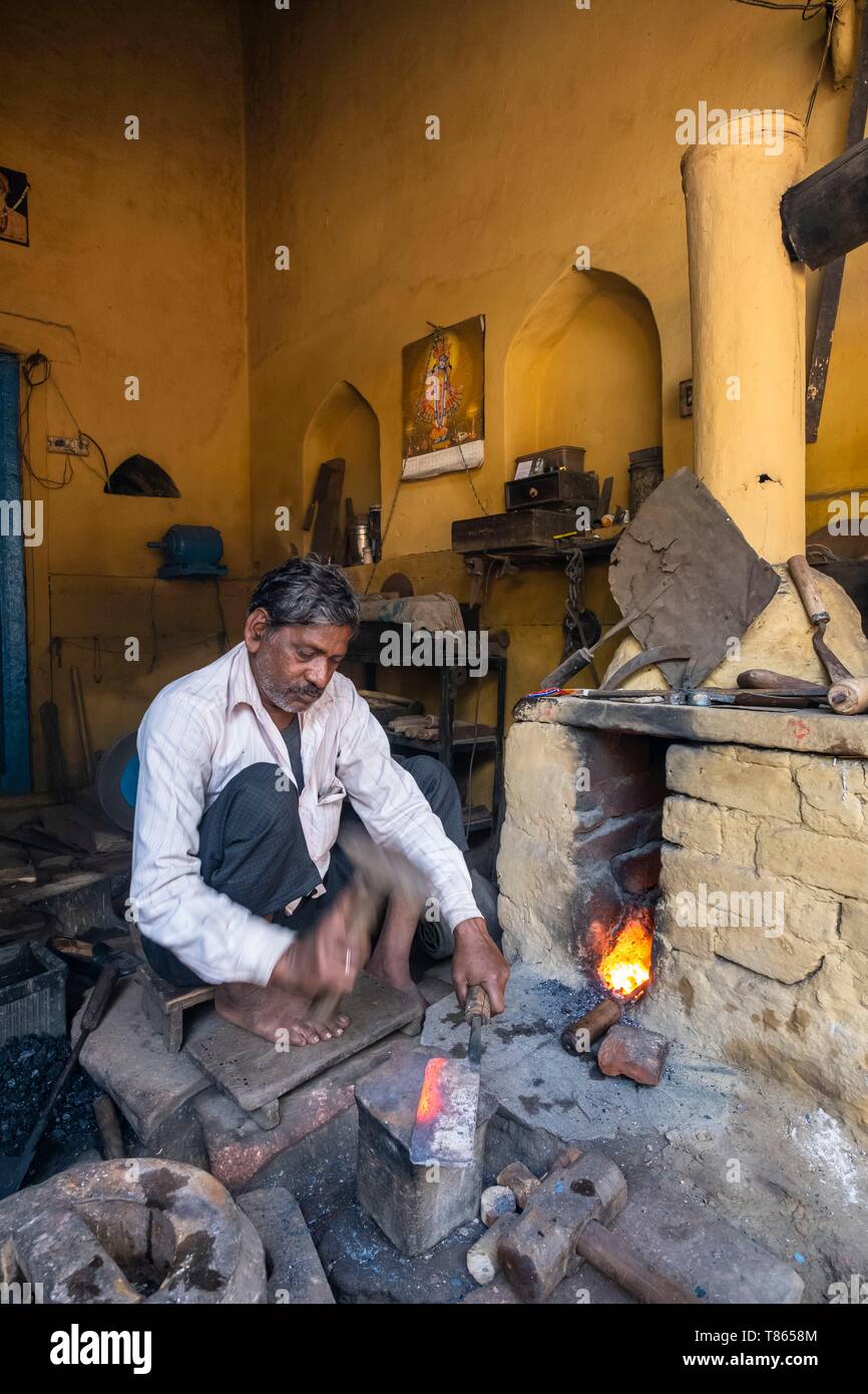 India, Rajasthan, Bharatpur, blacksmith in the old town Stock Photo - Alamy