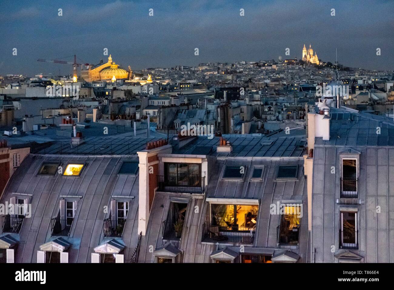 France, Paris, Zinc roofs of rue de Rivoli, Opera Garnier and Montmarte ...