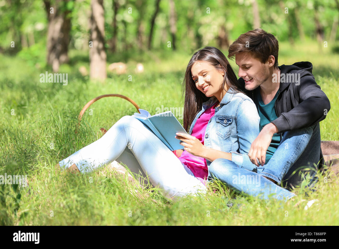 Happy lovely couple reading book hi-res stock photography and images ...