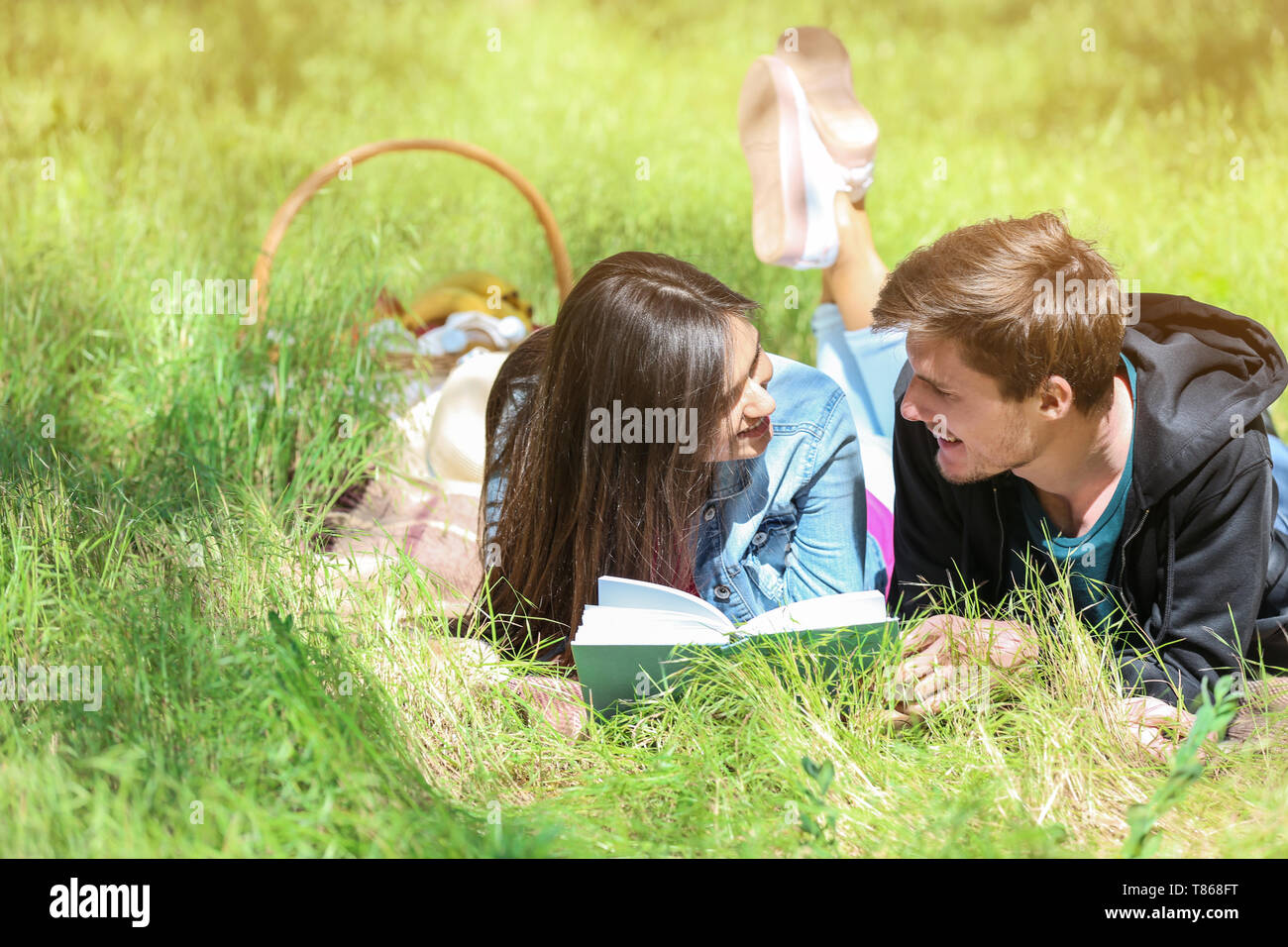 Happy lovely couple reading book hi-res stock photography and images ...
